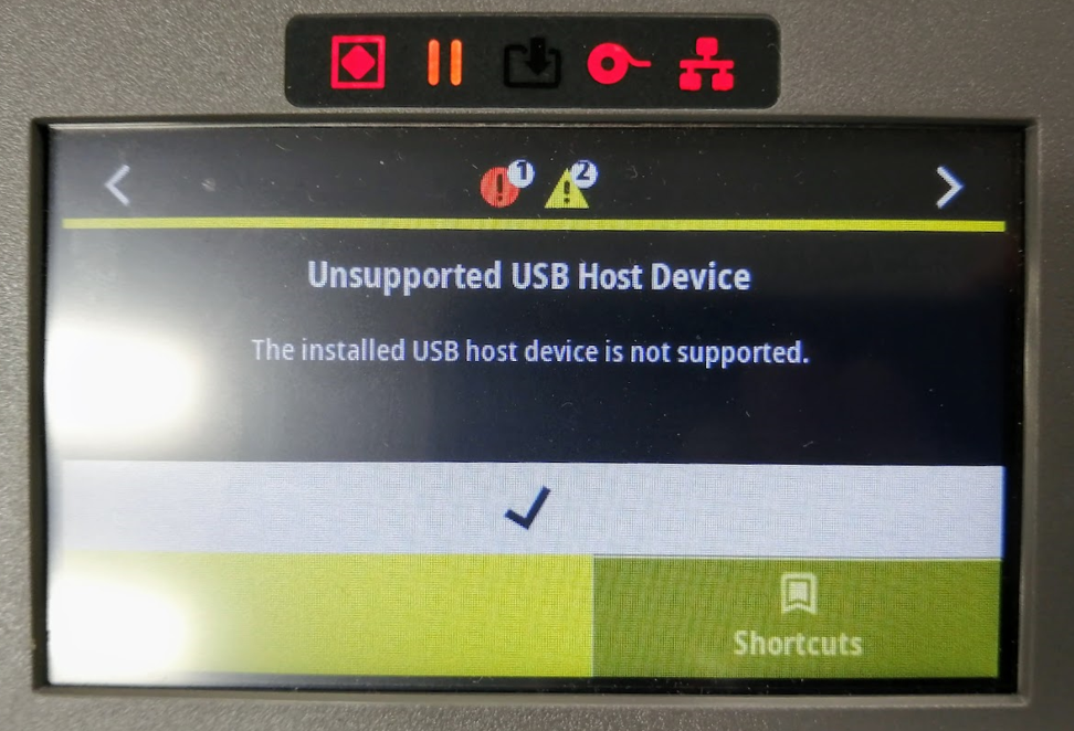 Warning Message (”Unsupported USB Host Device”) Displayed on the LCD ...